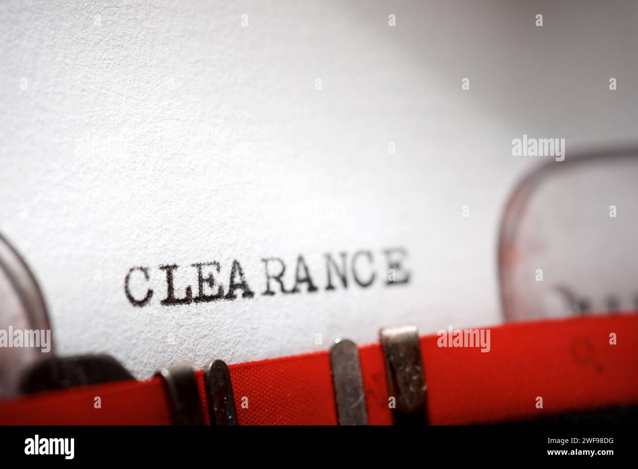 Clearance word written with a typewriter Stock Photo - Alamy
