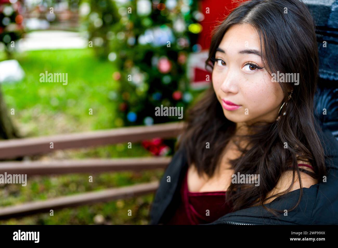 Close up of Beautiful Young Asian Woman Standing in Front of an Outdoor ...