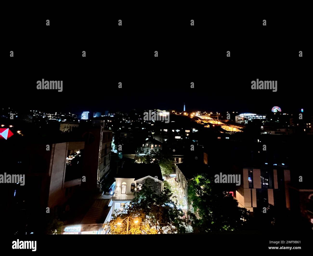 Aerial view of a sprawling cityscape under the night sky Stock Photo ...