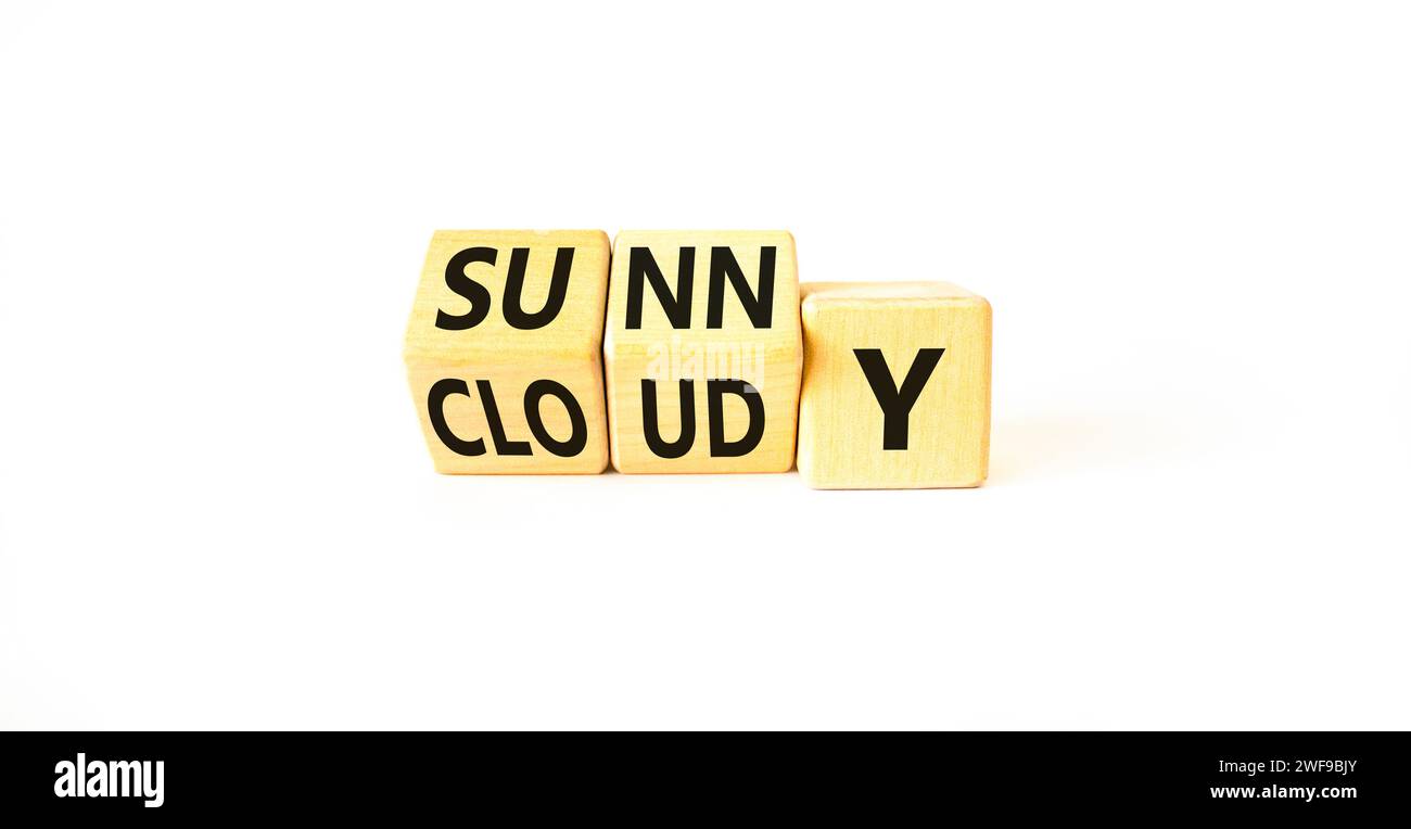 Sunny or cloudy symbol. Concept word Sunny or Cloudy on wooden cubes ...
