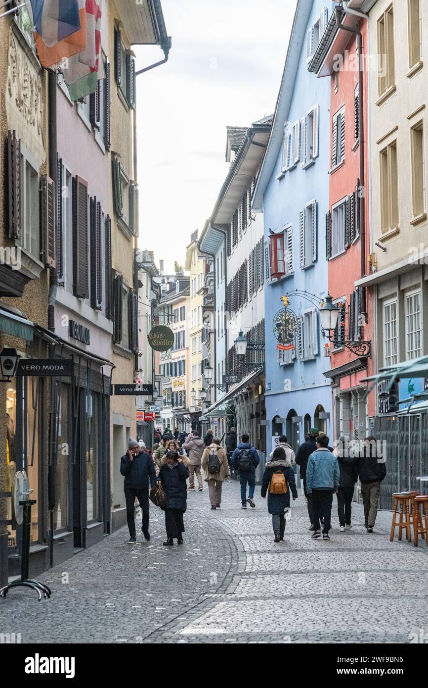 People / Tourists exploring and walking through the Altstadt old town ...
