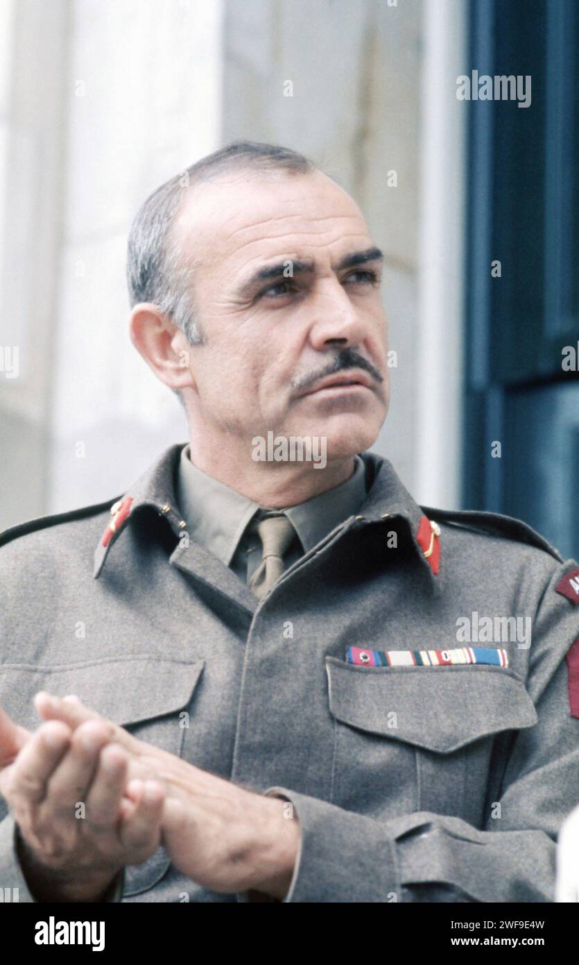 Sean Connery clapping, in soldiers uniform, on set of the movie A ...