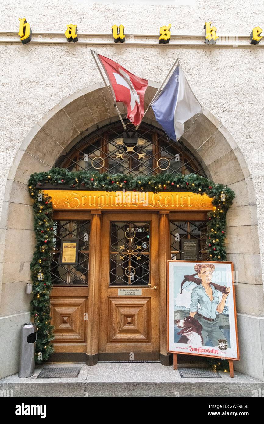 An entrance into the traditional Swiss Zeughauskeller Restaurant in ...