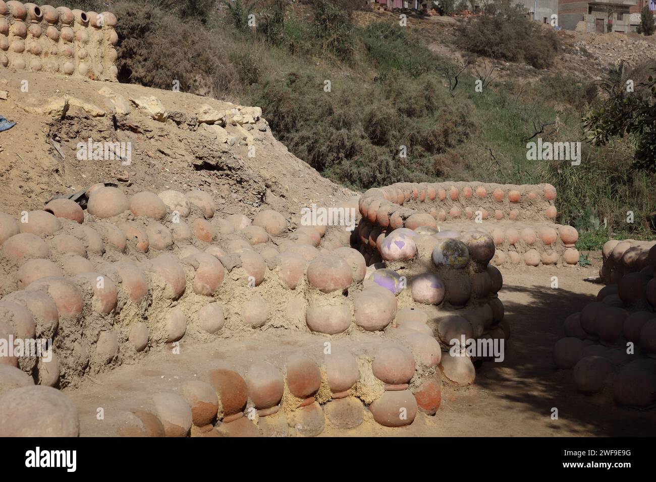 pottery, rubish, suny in a village Stock Photo - Alamy