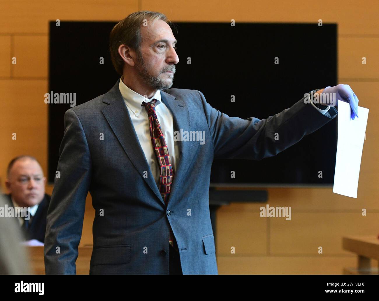 Defense attorney Jon Schoenhorn, representing Michelle Troconis, shows ...
