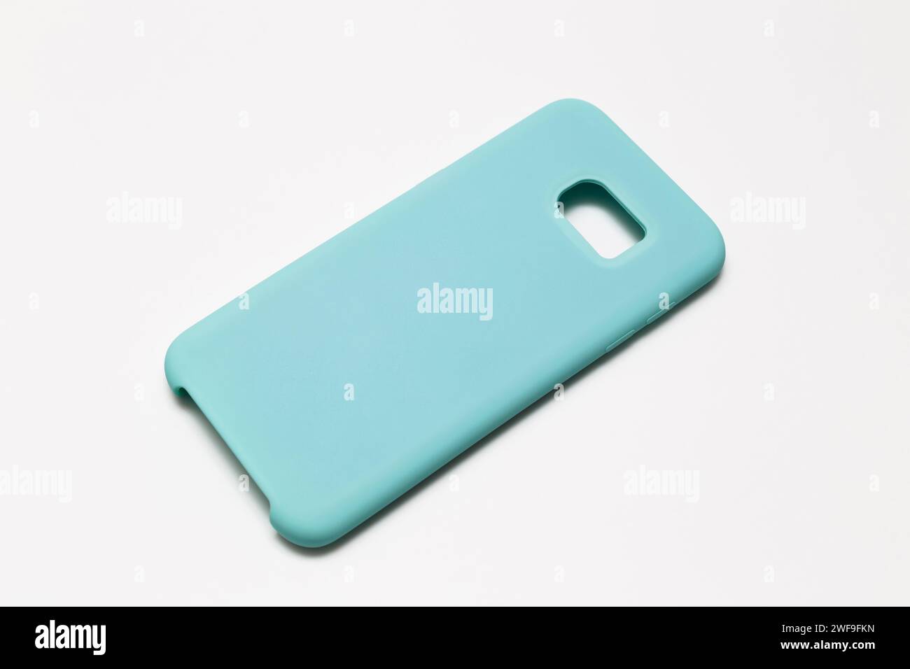 Beautiful soft pastel mint color mobile phone case isolated on white ...