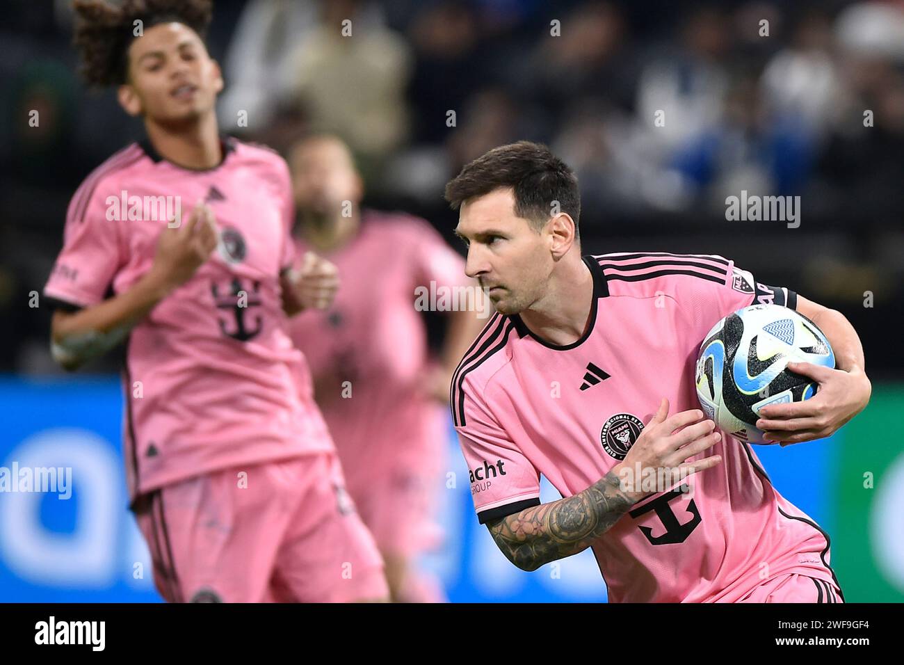 Inter Miami's Lionel Messi runs with the ball during the Riyadh Season ...