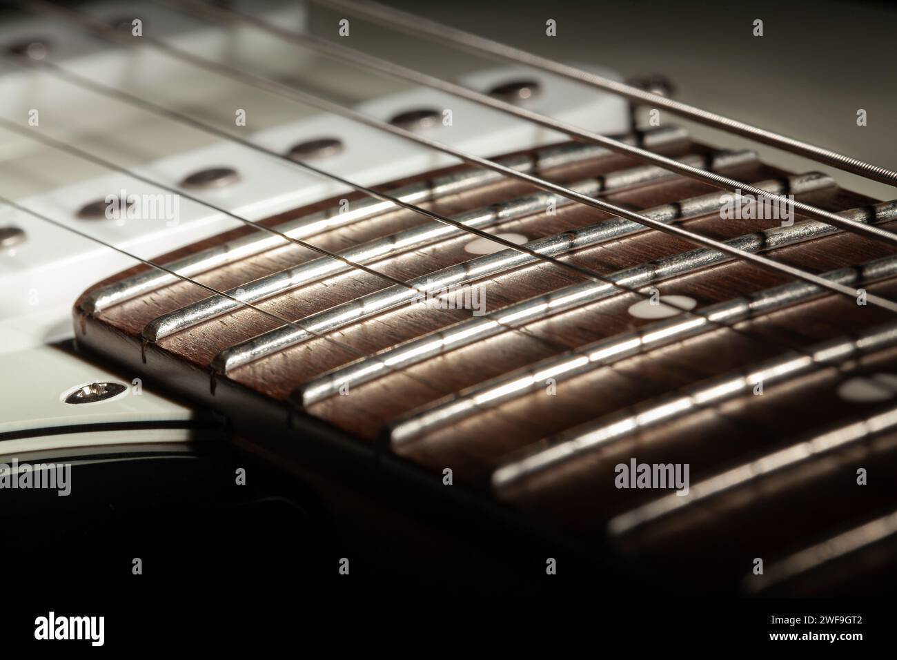 electric guitar fretboard body macro closeup Stock Photo - Alamy