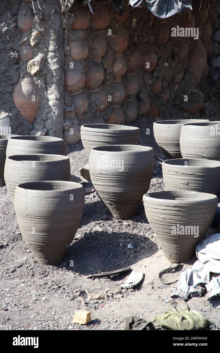 pottery, rubish, building in a village Stock Photo - Alamy