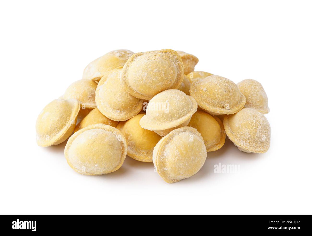 Yellow raw dumplings on white background Stock Photo - Alamy