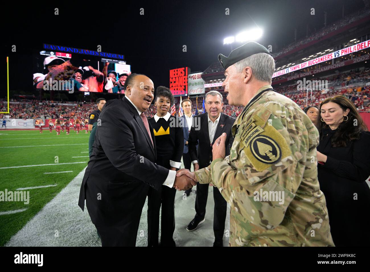 Martin Luther King III, left, shakes hands with Gen. Bryan Fenton ...