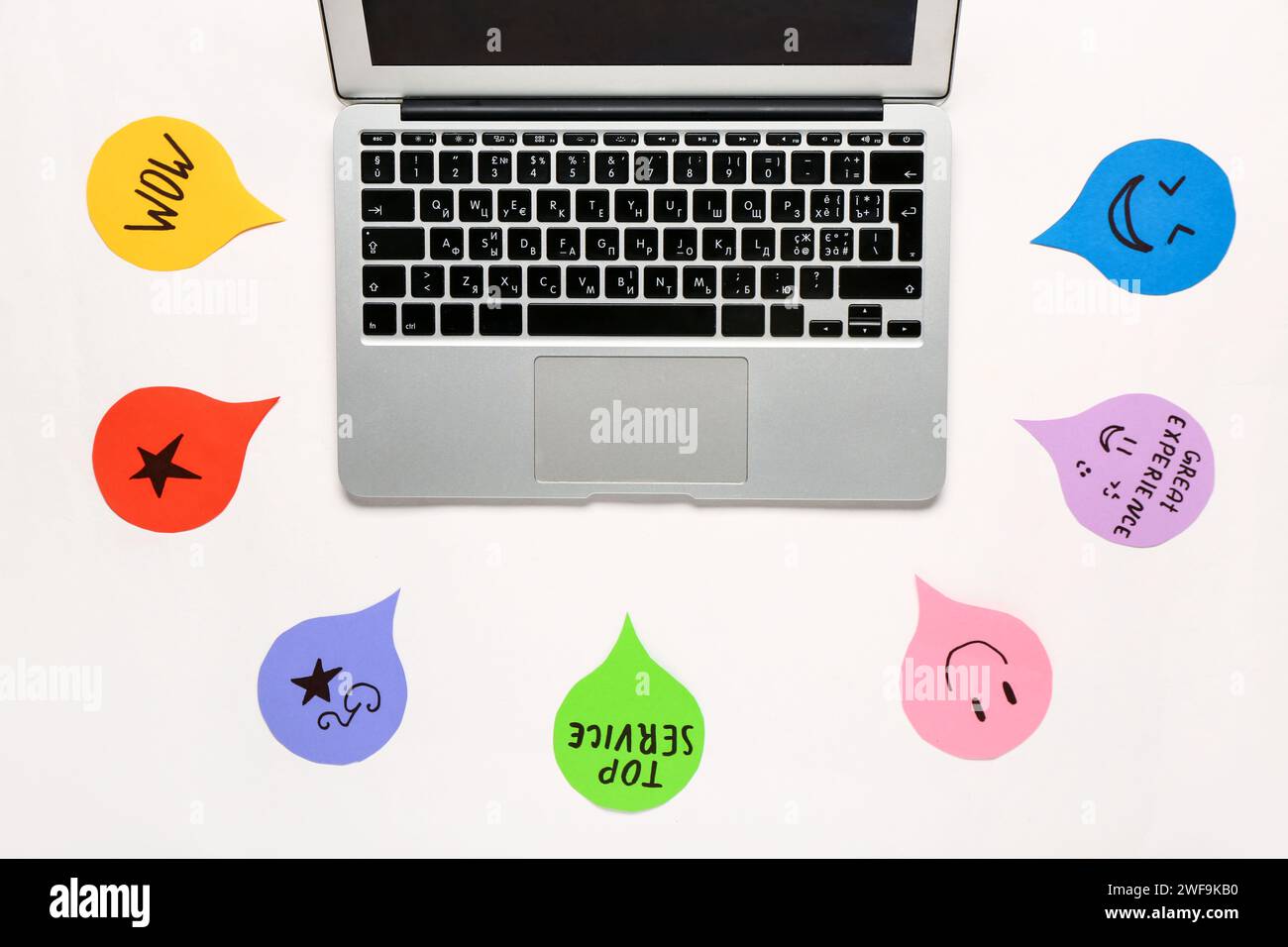 Speech bubbles with reviews and laptop on white background. Customer ...