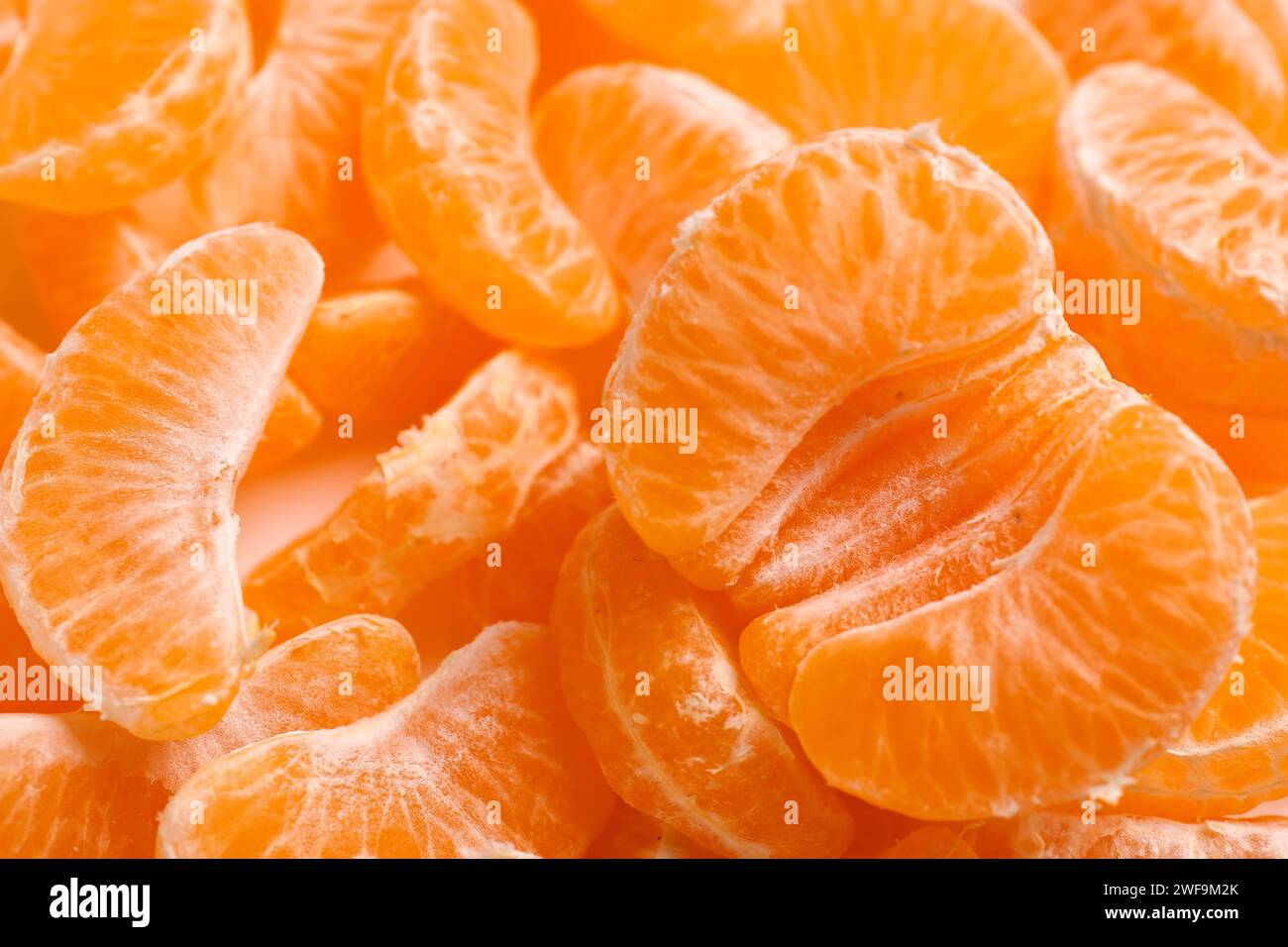Texture of sweet peeled mandarins as background Stock Photo - Alamy