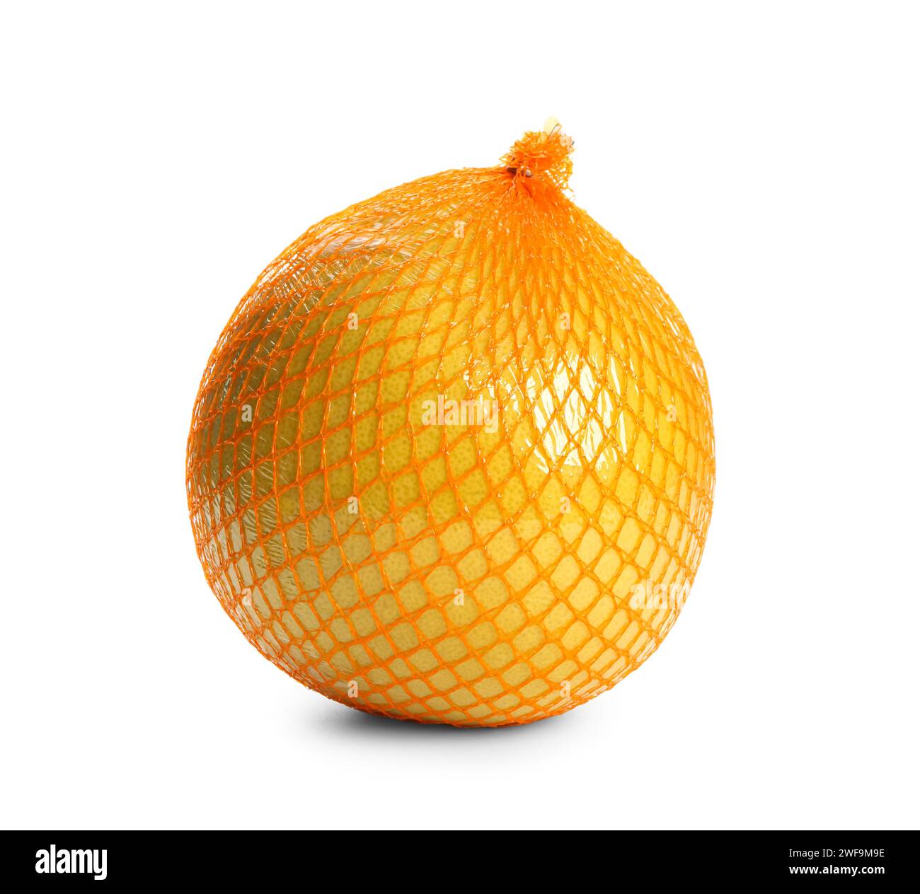 Fresh pomelo fruit in net on white background Stock Photo - Alamy