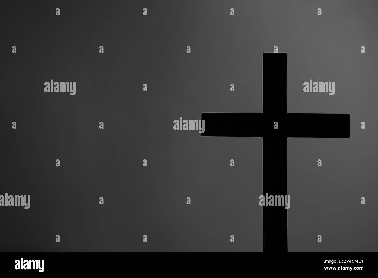 Wooden cross on grey background. Good Friday concept Stock Photo - Alamy