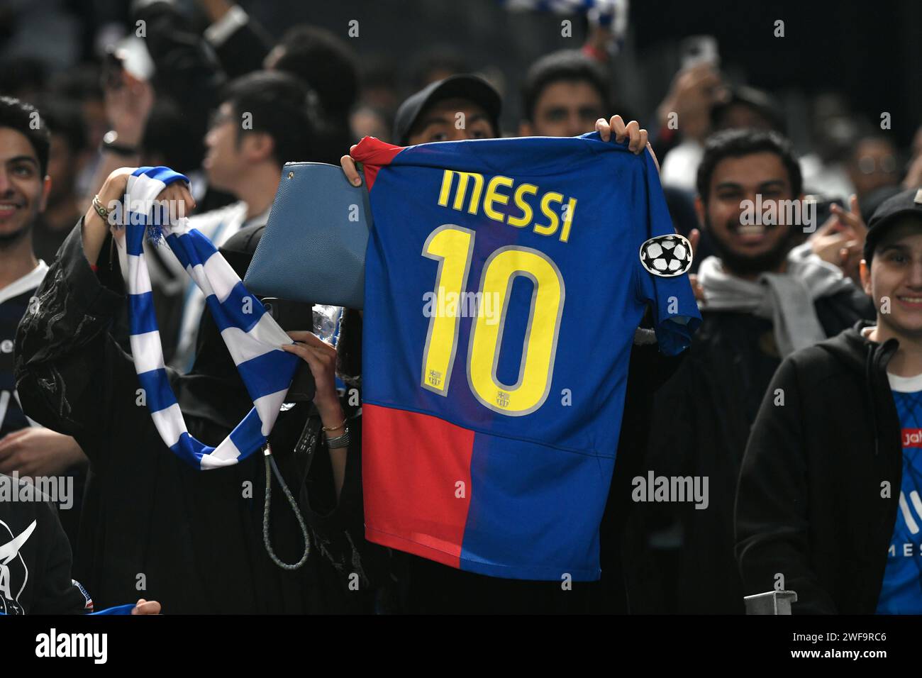 Saudi fans wave a T-shirt of Inter Miami's Lionel Messi during the ...