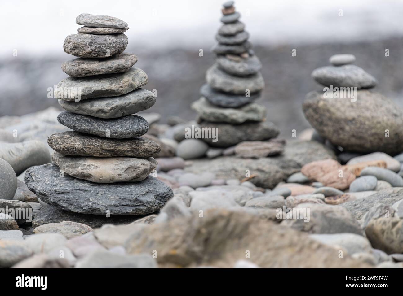 Close up of two towers of pebbles stacked up on a pebble beach Stock ...