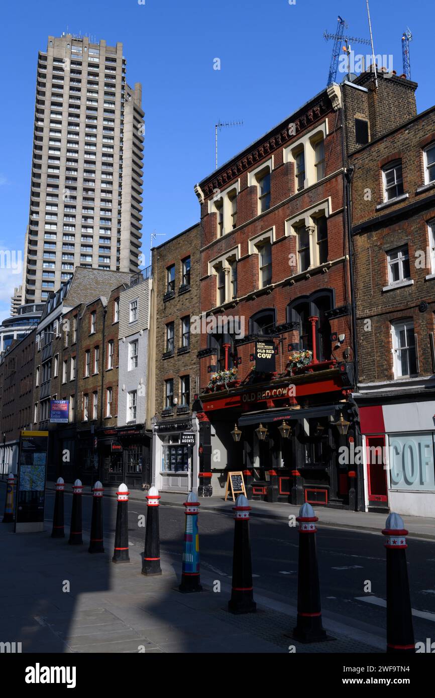 The Old Red Cow pub Long Lane, Smithfield, with the Lauderdale Tower, a ...