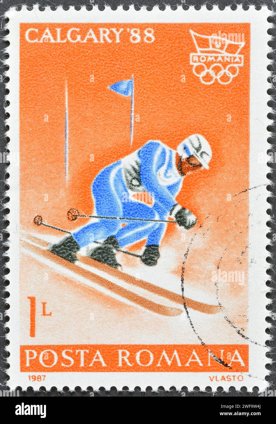 Cancelled postage stamp printed by Romania, that shows Slalom Skiing ...