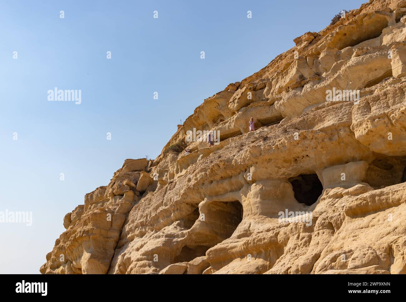 A picture of the Matala Caves Stock Photo - Alamy