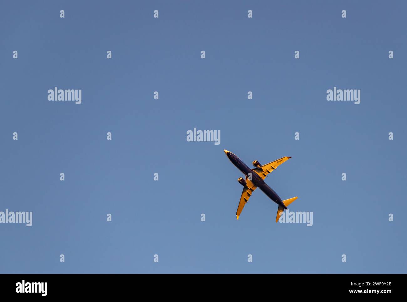 A picture of an Malta Air plane flying overhead Stock Photo - Alamy