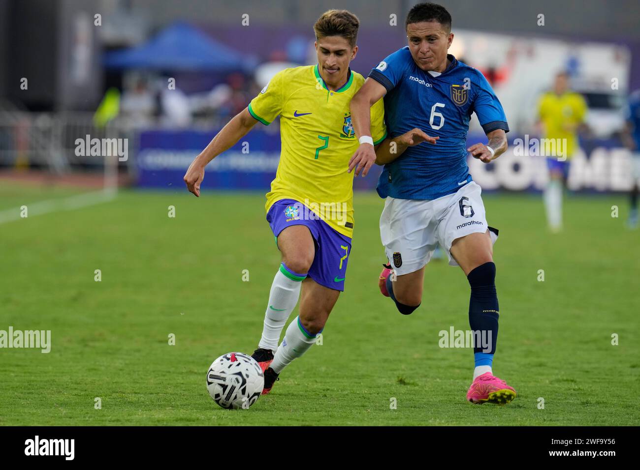 Brazil's Gabriel Pirani, left, and Ecuador's Layan Loor fight for the ...