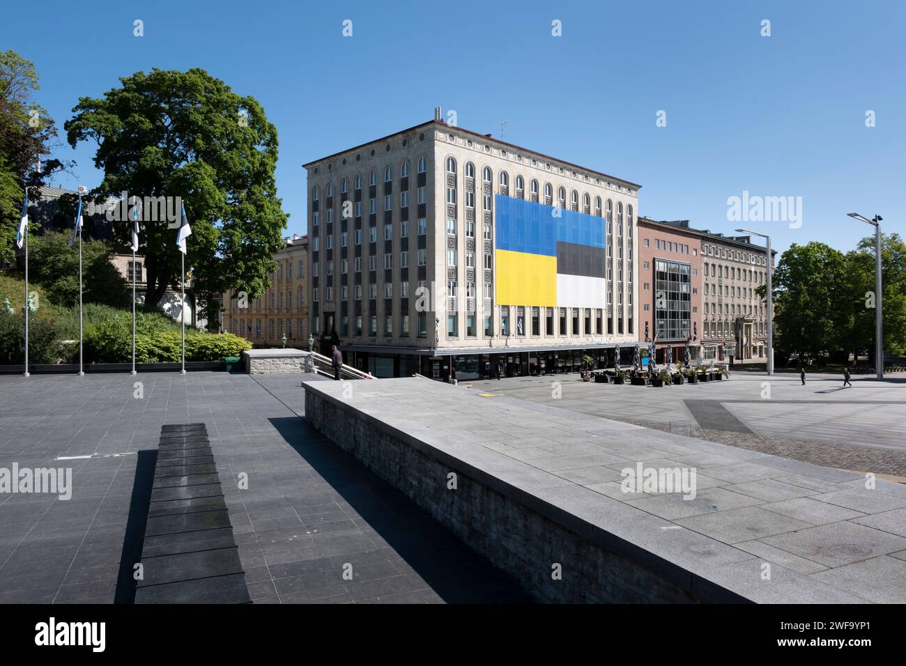 Huge yellow blue flag of Ukraine on the facade of the building of the ...