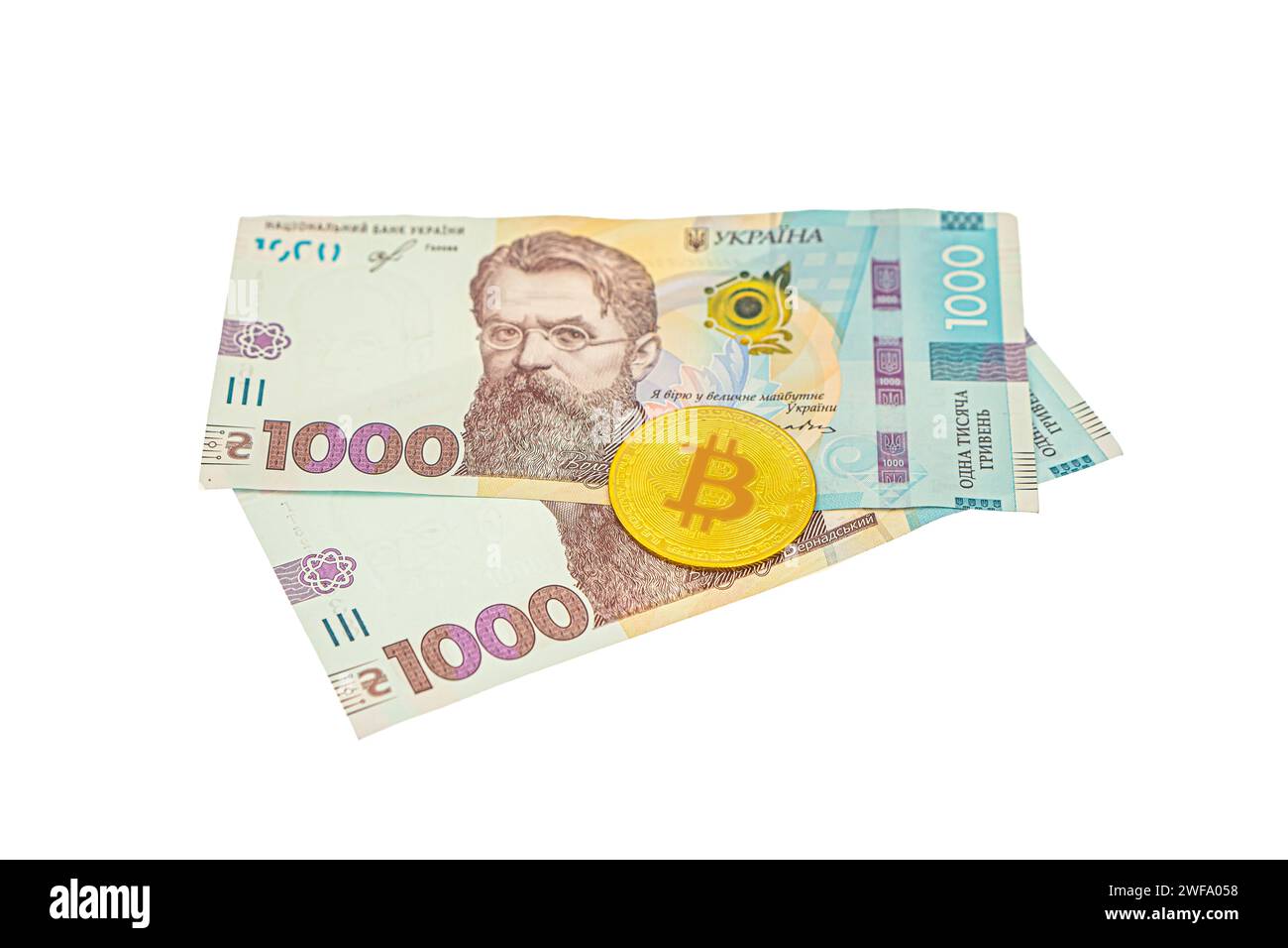 Bitcoin coins new virtual money on Ukraine banknotes close up image of ...