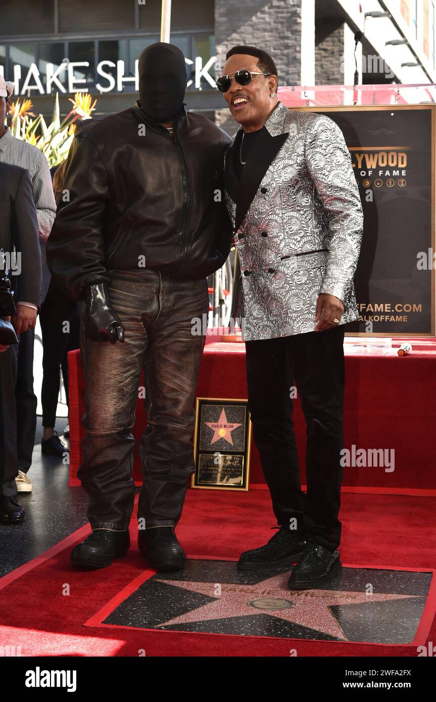 Kanye West, left, and Charlie Wilson attend a ceremony honoring Wilson ...