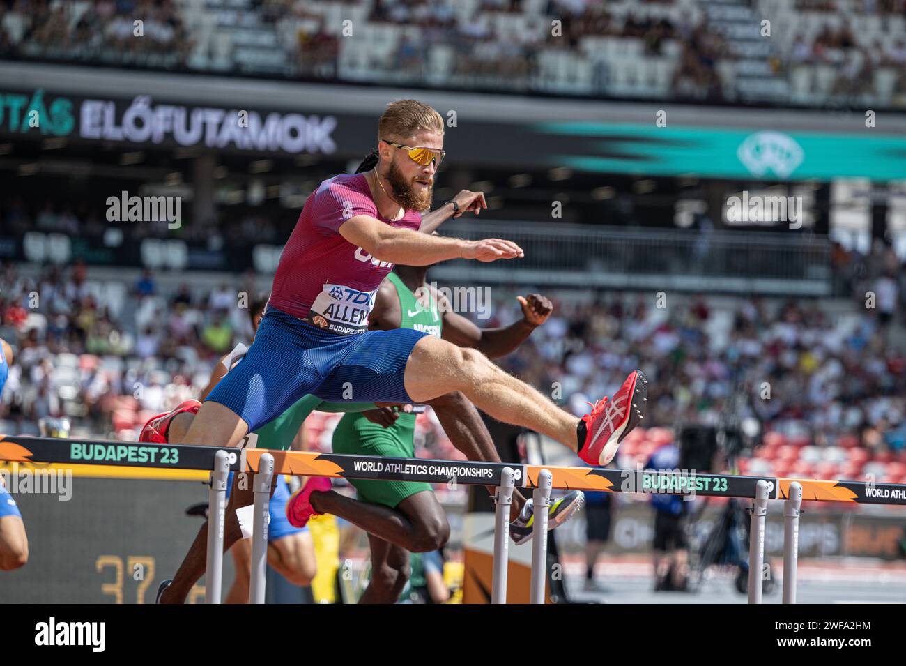 CJ ALLEN participating in the 400 meters hurdles at the World Athletics ...