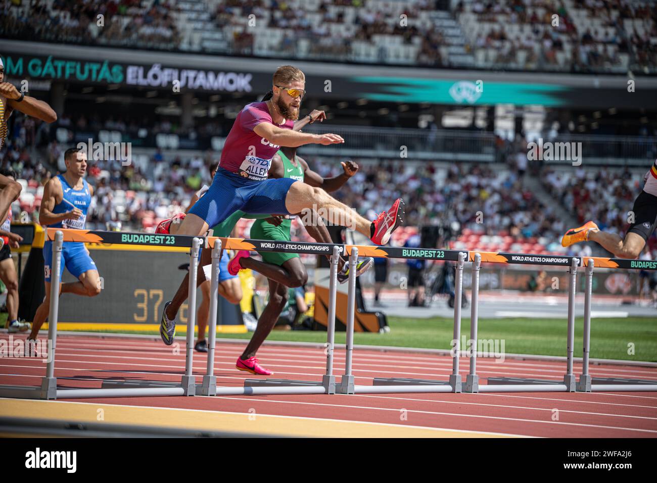 CJ ALLEN participating in the 400 meters hurdles at the World Athletics ...