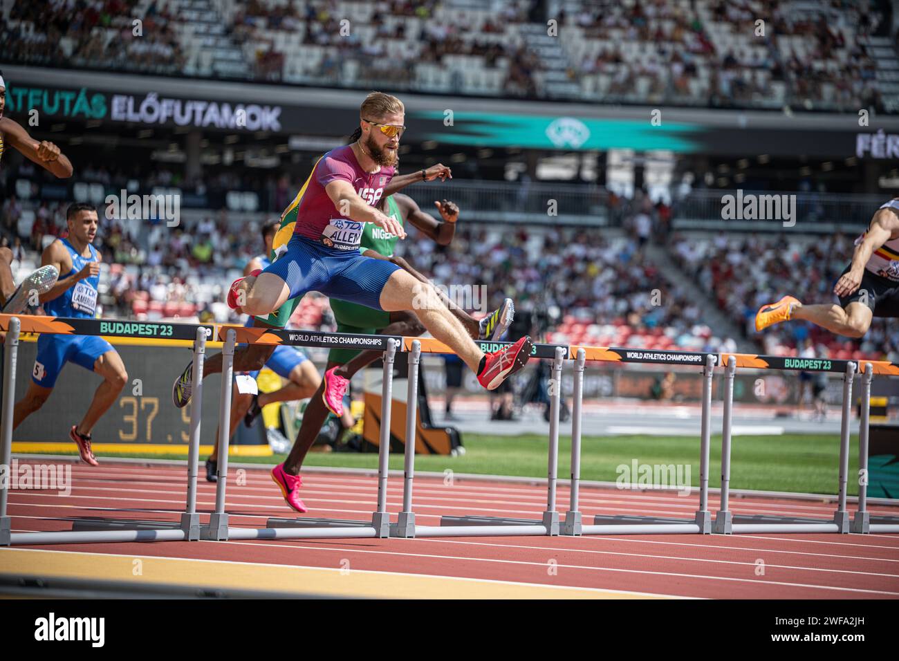 CJ ALLEN participating in the 400 meters hurdles at the World Athletics ...