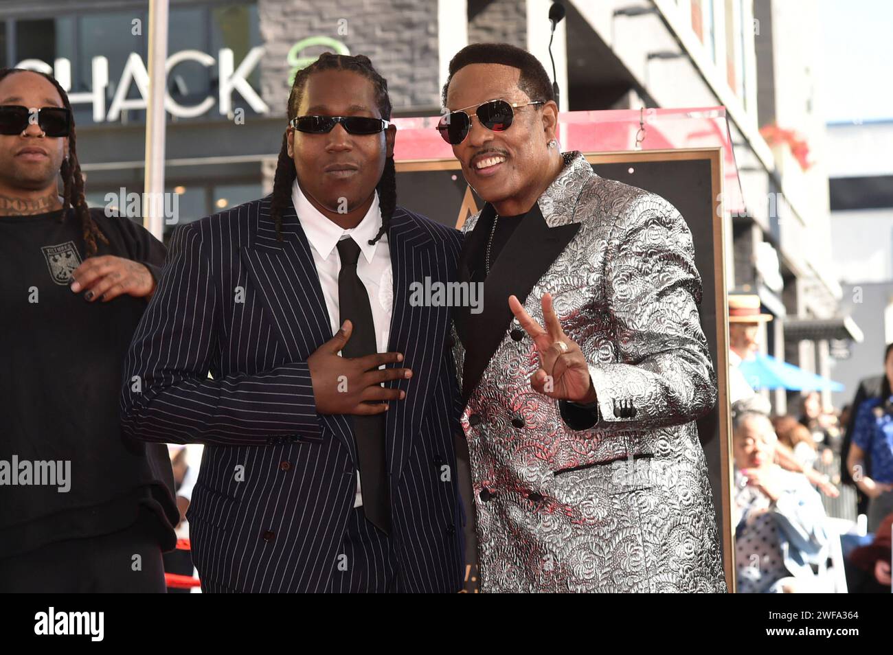 Don Toliver, left, and Charlie Wilson attend a ceremony honoring Wilson ...