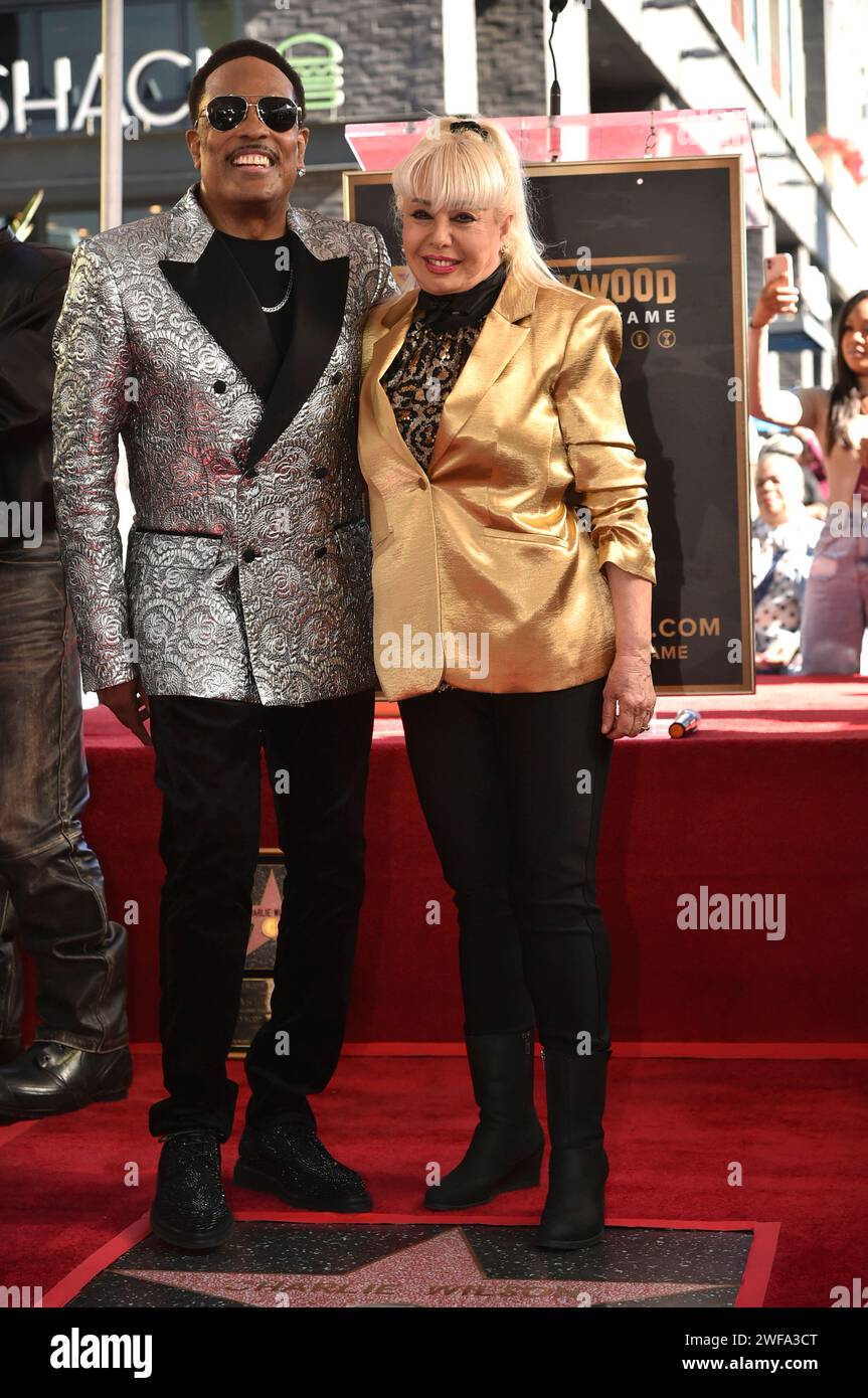 Charlie Wilson, left, and Mahin Wilson attend a ceremony honoring ...