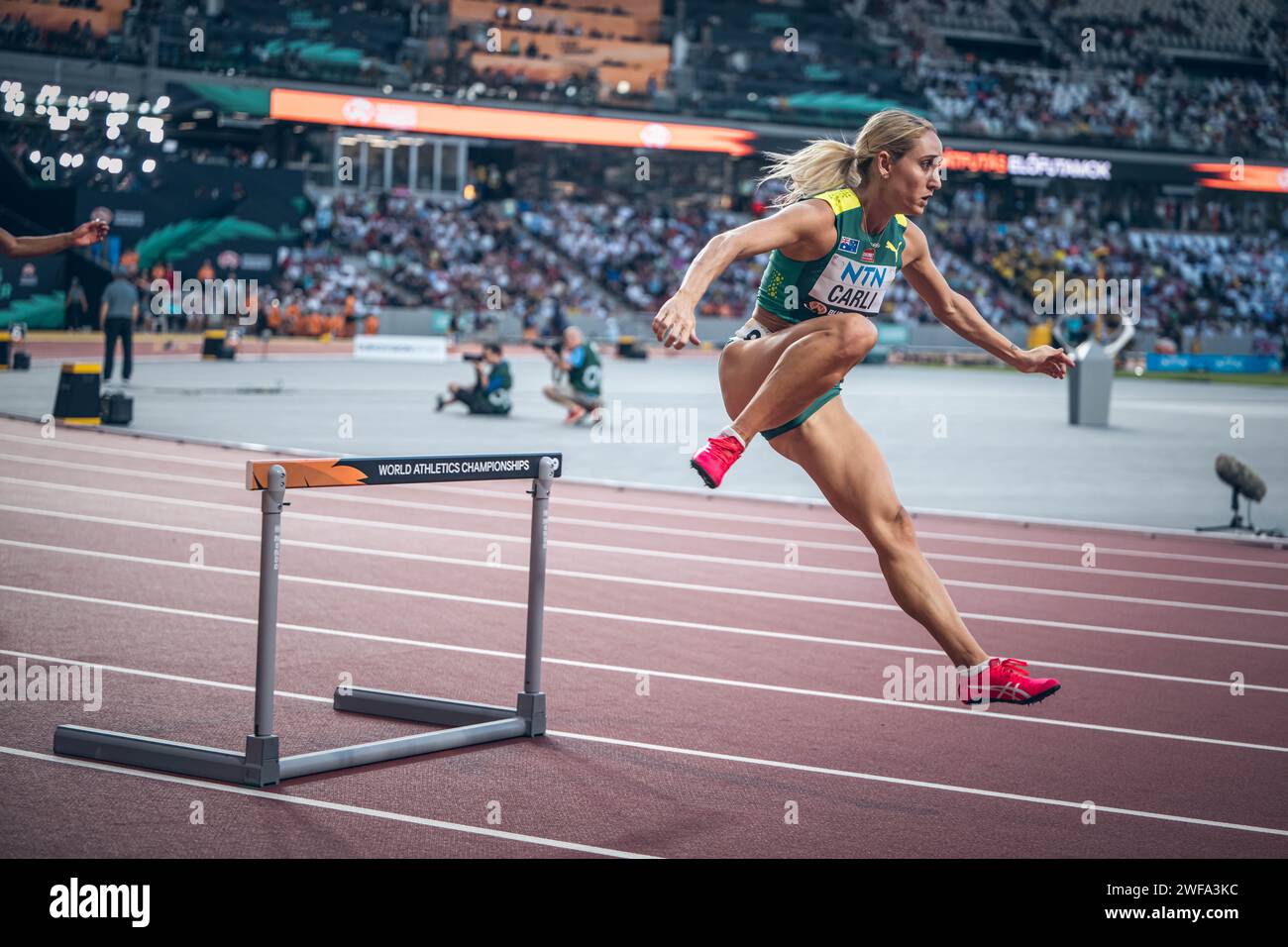 Sarah Carli participating in the 400 meters hurdles at the World ...