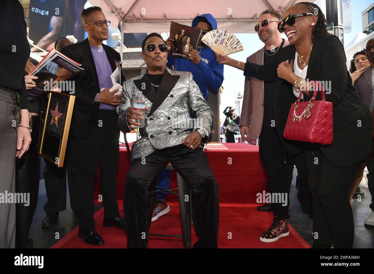 Charlie Wilson, Snoop Dogg, and Shante Broadus attend a ceremony ...