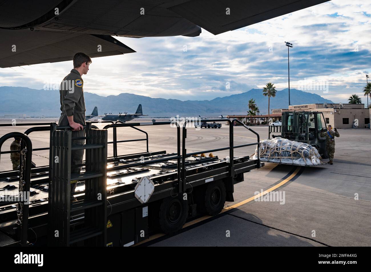 Air Freight Service Technicians load a C -130J Super Hercules in ...