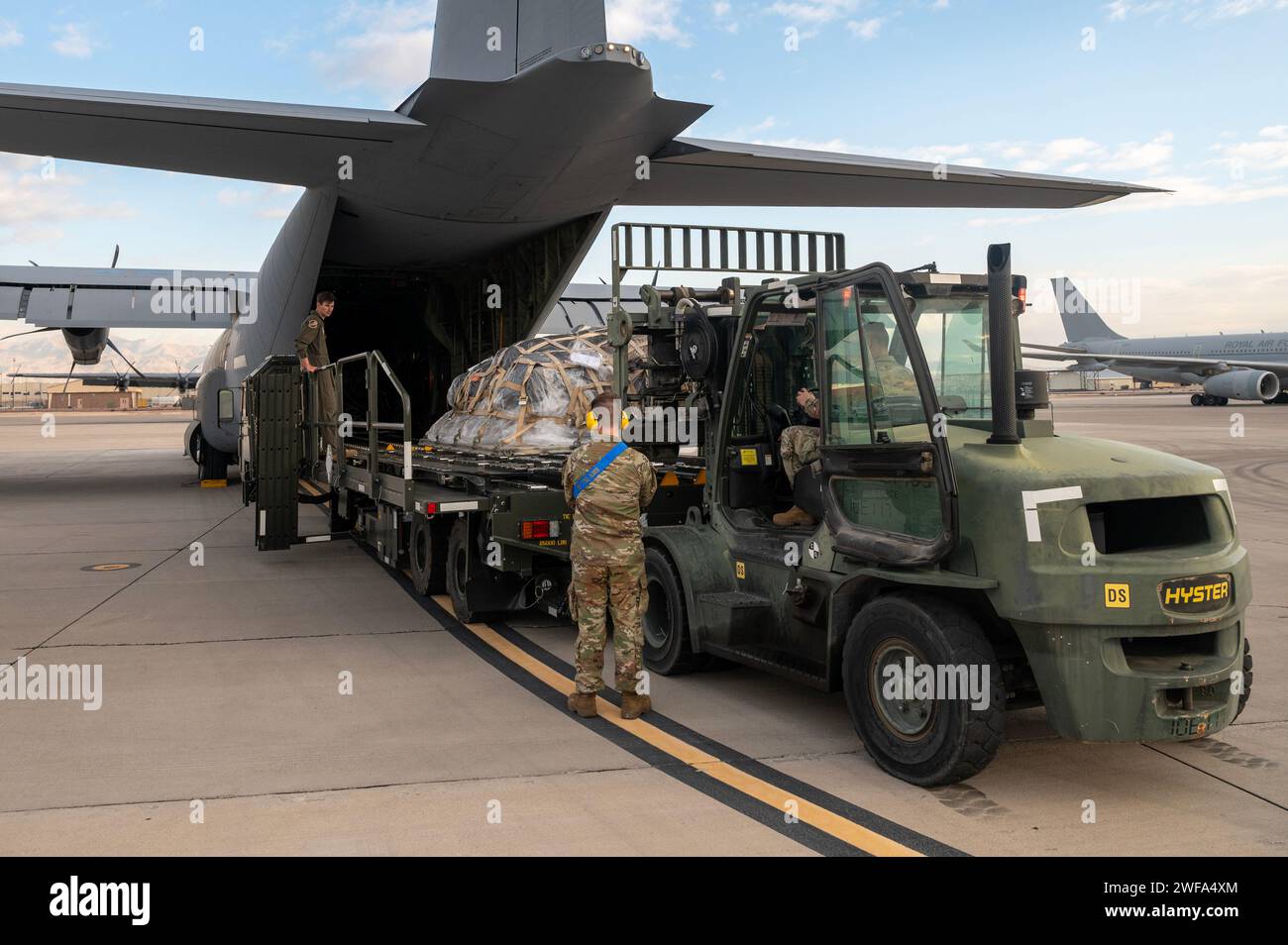 Air Freight Service Technicians load a C -130J Super Hercules in ...