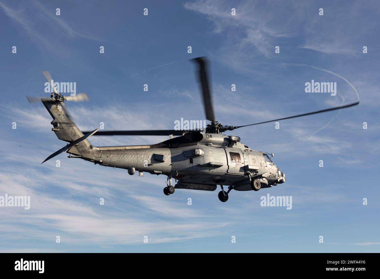 240126-N-LM220-2118 PACIFIC OCEAN (Jan. 26, 2024) An MH-60S Sea Hawk ...