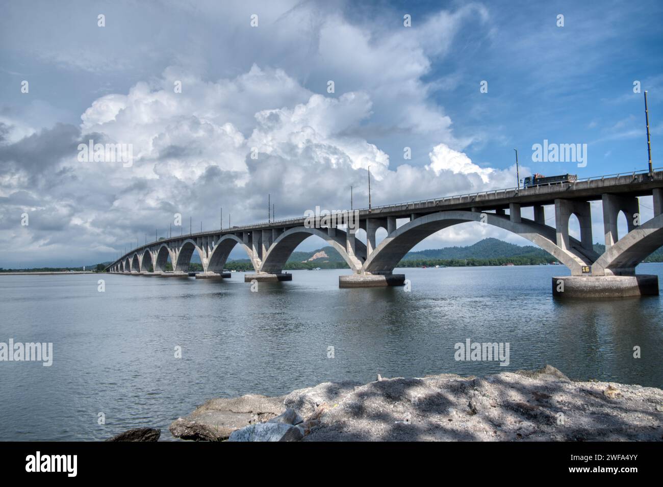 daytime scene activity around the concrete bridge Stock Photo - Alamy