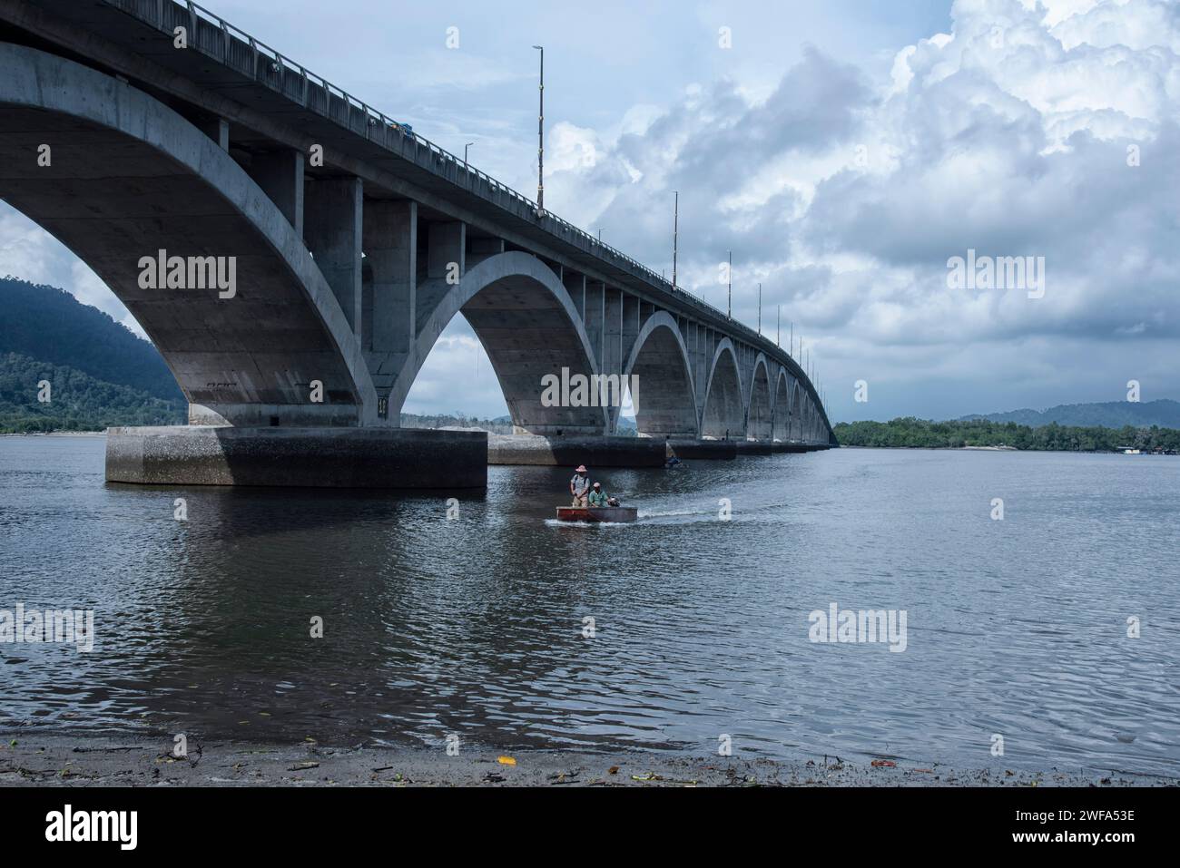 daytime scene activity around the concrete bridge Stock Photo - Alamy