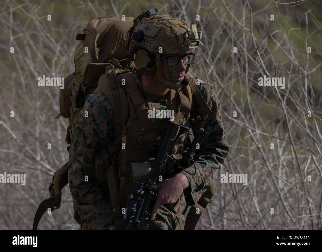 U.S. Marine Corps Sgt. Jonathan Walker, a radio operator with 1st Air Naval Gunfire Liaison ...