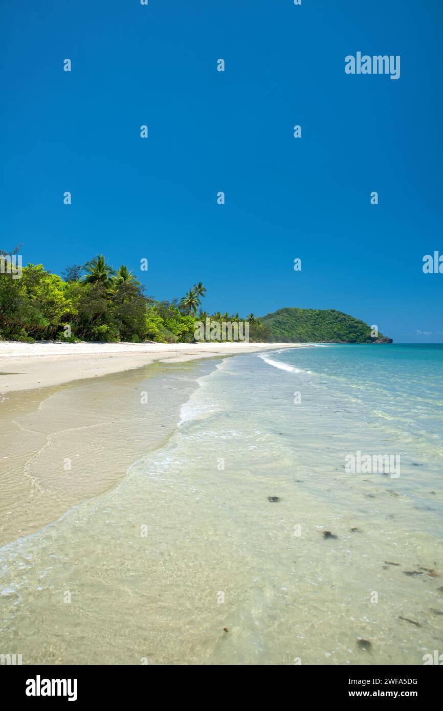A serene coastal landscape of Thornton Beach, Daintree National Park ...