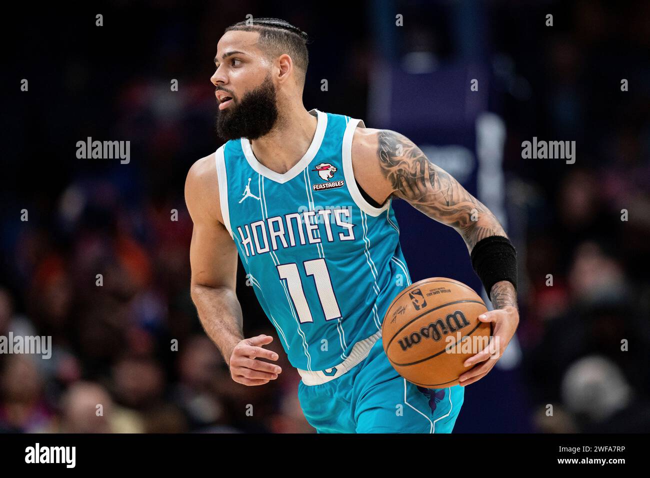 Charlotte Hornets forward Cody Martin brings the ball up court during ...