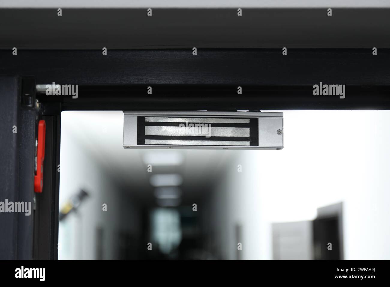 Electromagnetic door lock indoors, closeup. Home security Stock Photo ...
