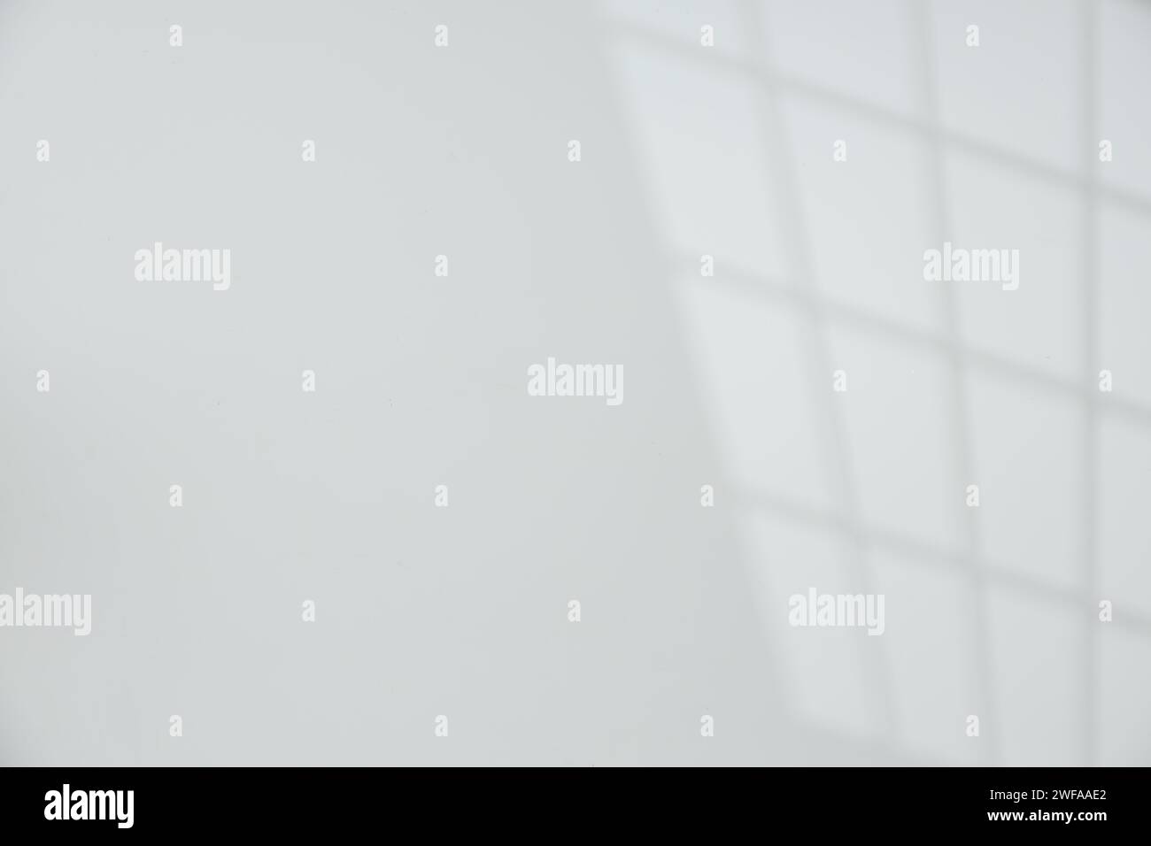 Light and shadow from window on white wall, space for text Stock Photo ...