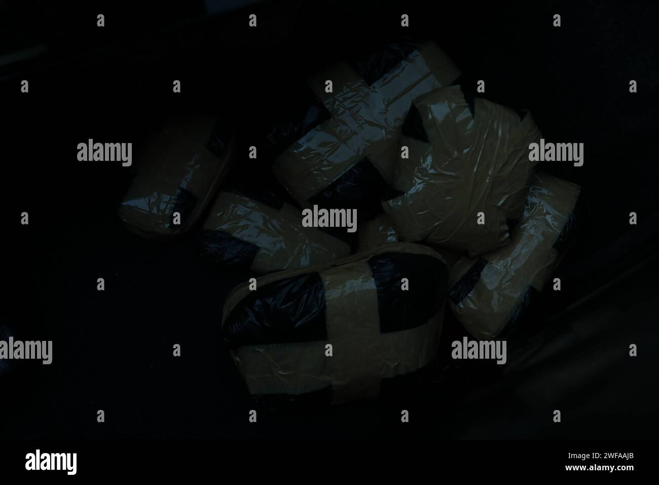 Packages with narcotics on black background, Drug addiction Stock Photo ...