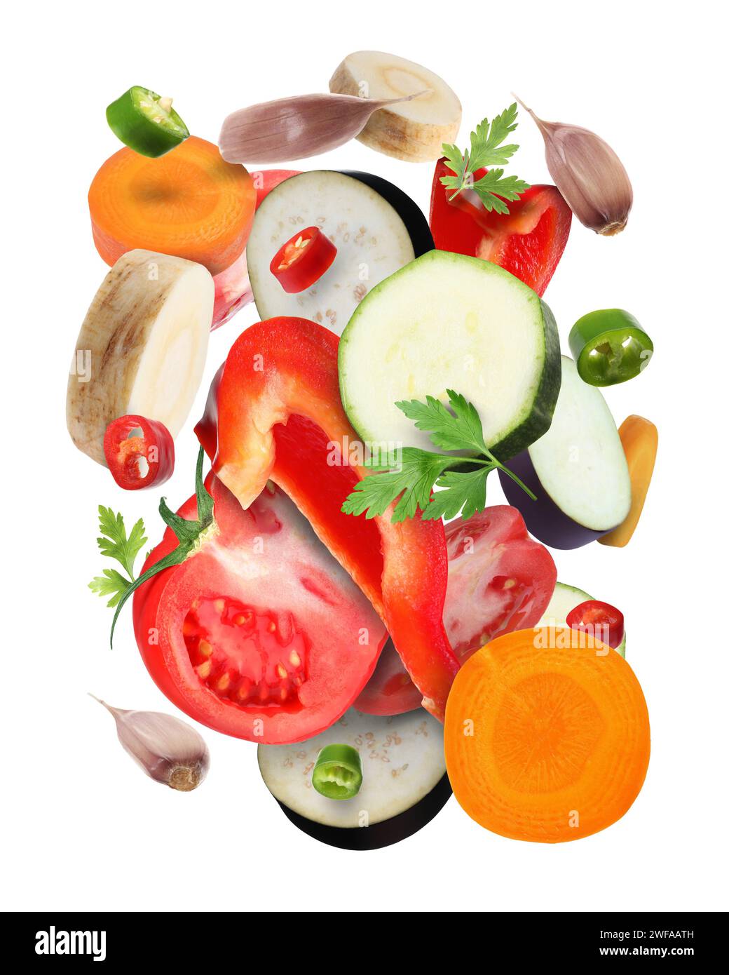 Different fresh vegetables and spices in air on white background Stock ...