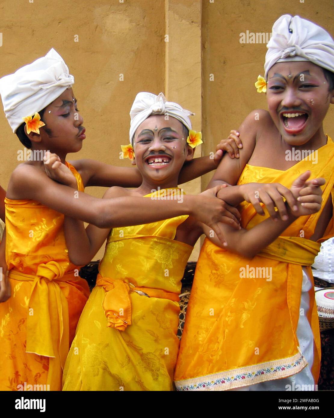 Children from a small village dressed in traditional Balinese dance ...
