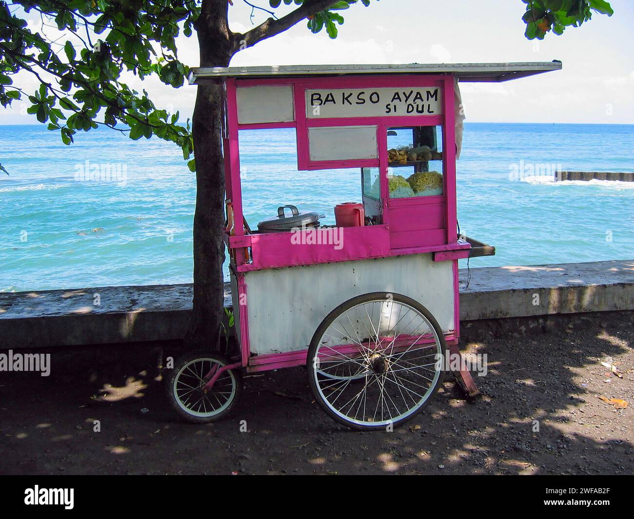 A gerobak or traditional Indonesian street food cart selling Bakso Ayam ...